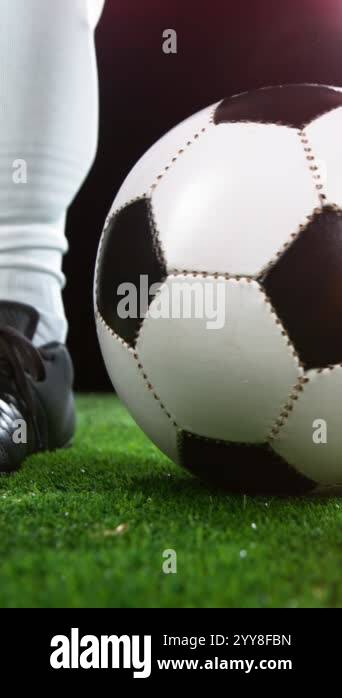 Super Slow Motion of Rotating Soccer Ball on Grass. Filmed on High ...