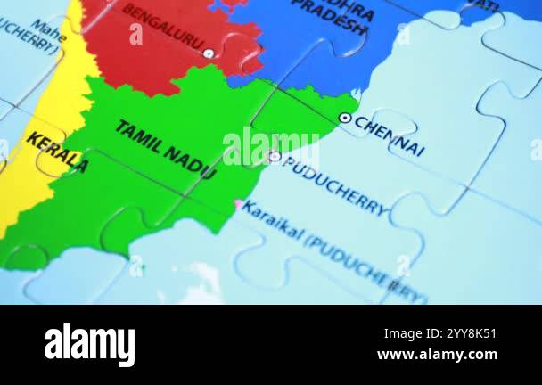 A human hand with a map pin pointing Chennai - the capital of Tamil ...