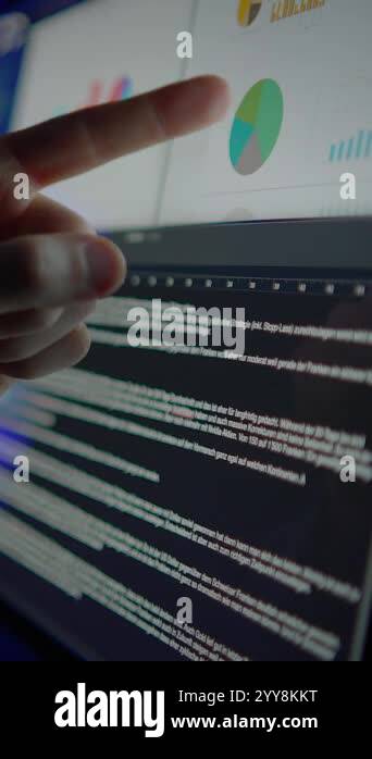 A hand points to data visuals on a screen, illustrating the importance of modern analytics for ...