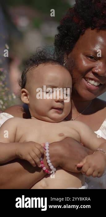 A joyful moment of affection between a loving mother and her adorable ...