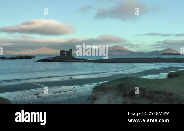 Ballinskelligs beach and castle on the Ring of Kerry, County Kerry ...
