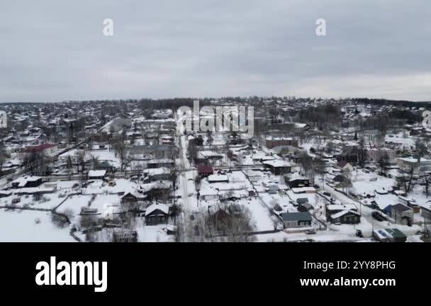 A breathtaking aerial perspective of a tranquil snow covered town ...