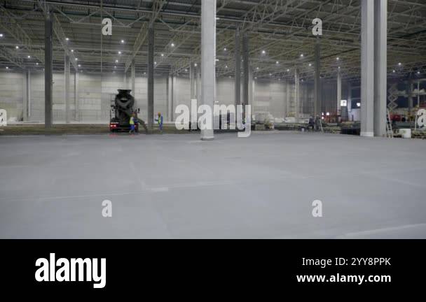 A large, currently empty warehouse designed for industrial use ...