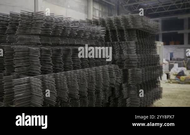 A vast and impressive array of neatly stacked steel reinforcements in a ...