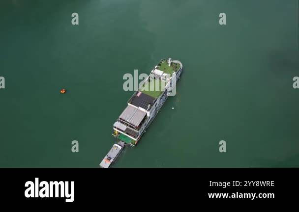Aerial view of a watercraft floating on the liquid water, showcasing ...