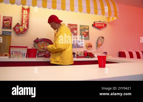Attractive restaurant worker prepare for serving food for customer ...