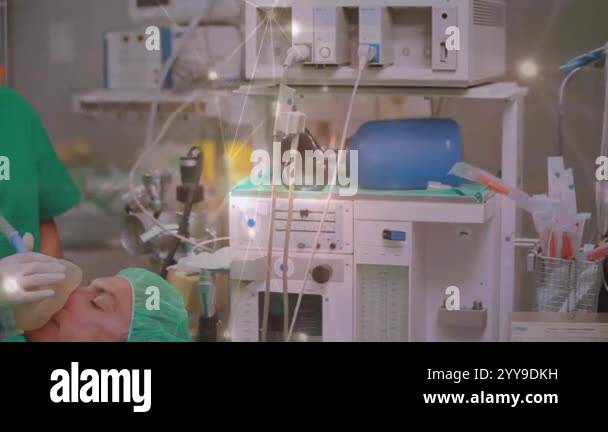 Assisting patient with anesthesia, medical professional using ...