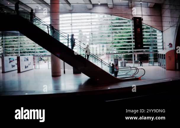 Monte Carlo, Monaco - October 4, 2024: People on the escalator in the ...