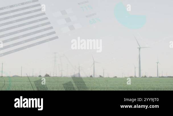 Wind turbines in field with data visualization animation overlaid ...
