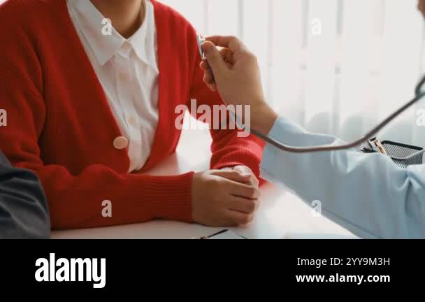 Patient attend doctors appointment at clinic or hospital office. Doctor examining and diagnosis ...