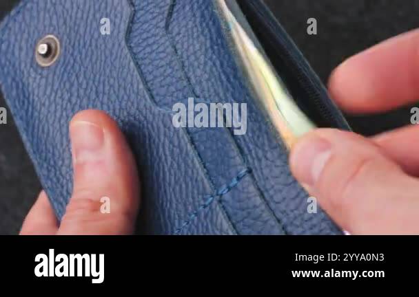 Closeup of Euro banknotes of different denominations being extracted ...