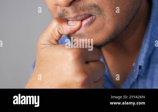 Biting his nails Stock Videos & Footage - HD and 4K Video Clips - Alamy