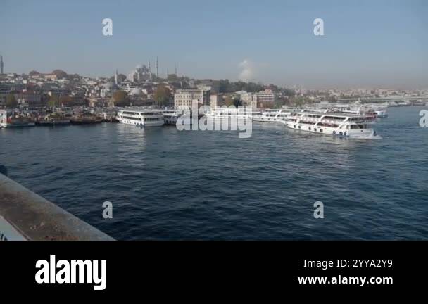The beautiful view of the Istanbul waterfront features boats and the ...