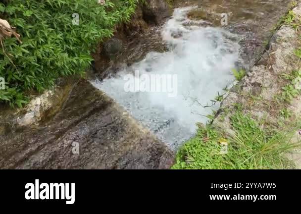 Close up view of river currents or water ripples. Clear fresh water ...