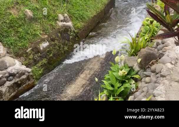 Water flow down on the ditch or small paved river Stock Video Footage ...