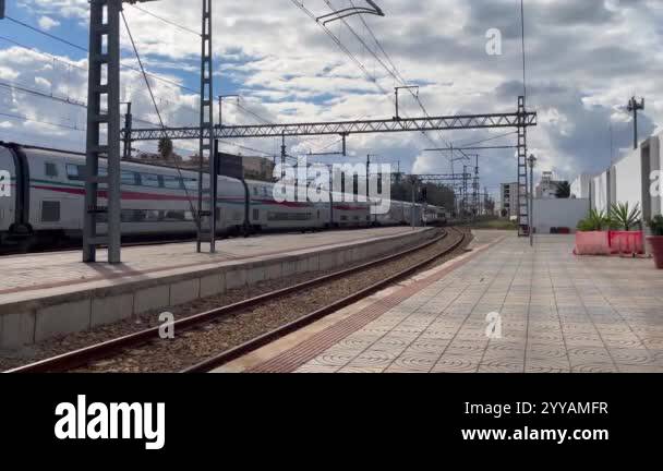 Modern high-speed Al Boraq TGV train in Morocco arriving at a deserted ...