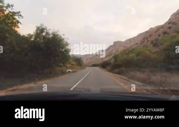 Stock video 4K Point of View Hyperlapse Time-lapse of car driving pass ...