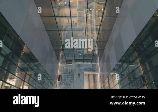 Aerial view of Windows in a high-rise office building early morning ...
