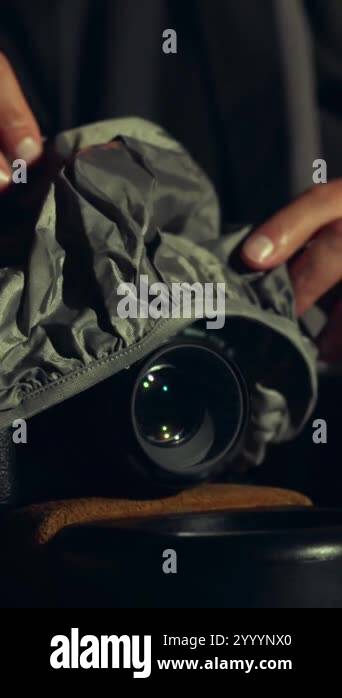 A man is secretly filming a video while watching a movie at the cinema ...