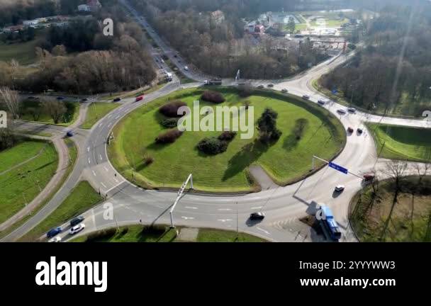 A dynamic shot of a roundabout, capturing the smooth movement of ...
