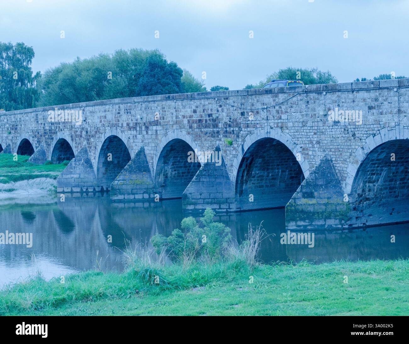 The historic arched stone bridge at Pontaubault, France where General ...