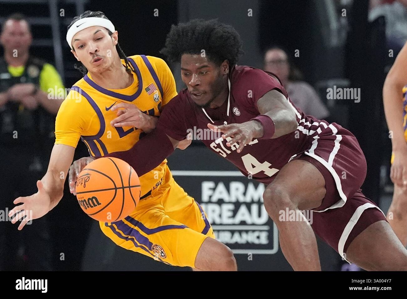 Mississippi State forward Cameron Matthews (4) reaches in to steal the ...