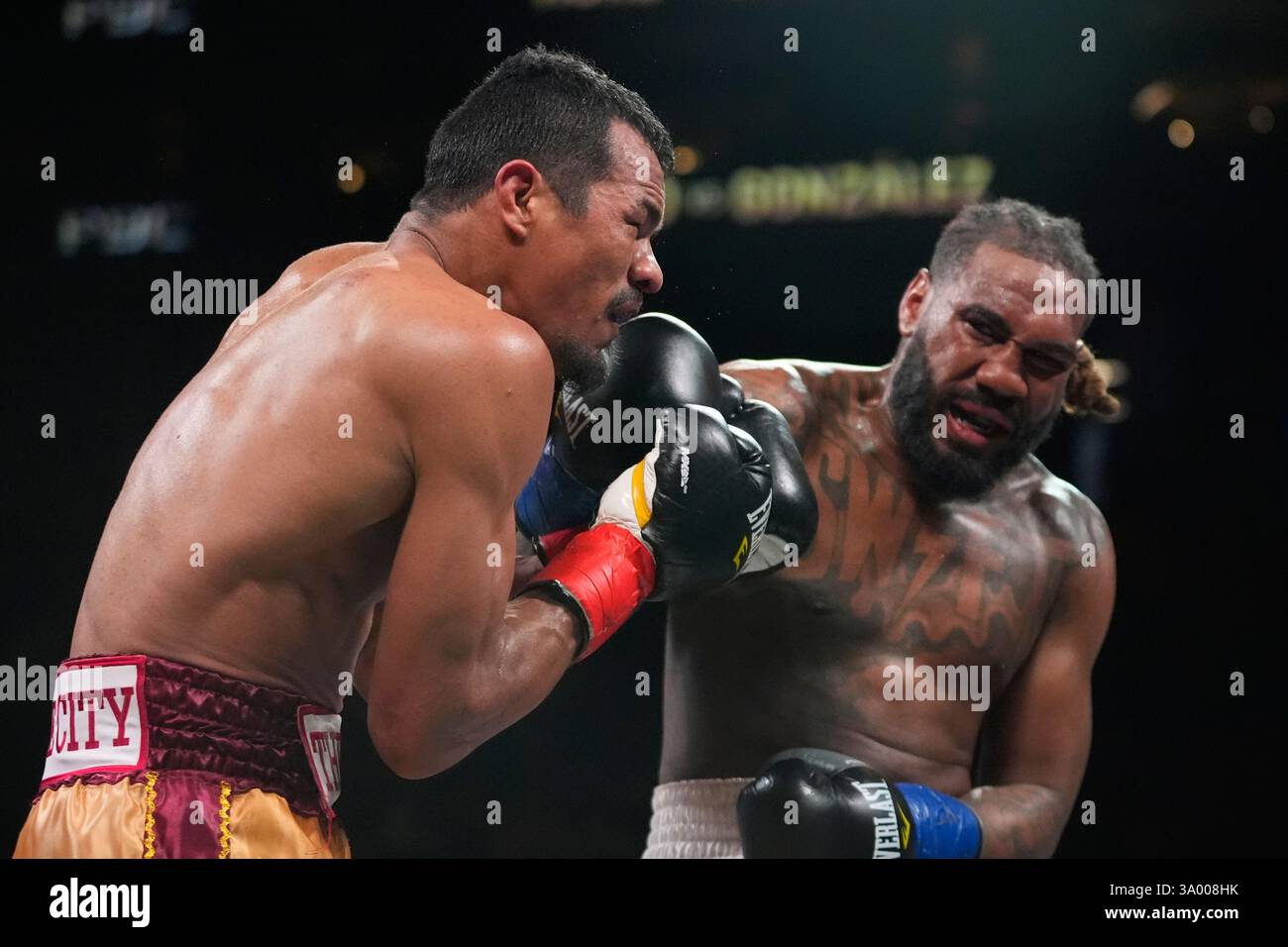 Jarret Hurd, right, punches Venezuela's Johan Gonzalez during the ninth ...