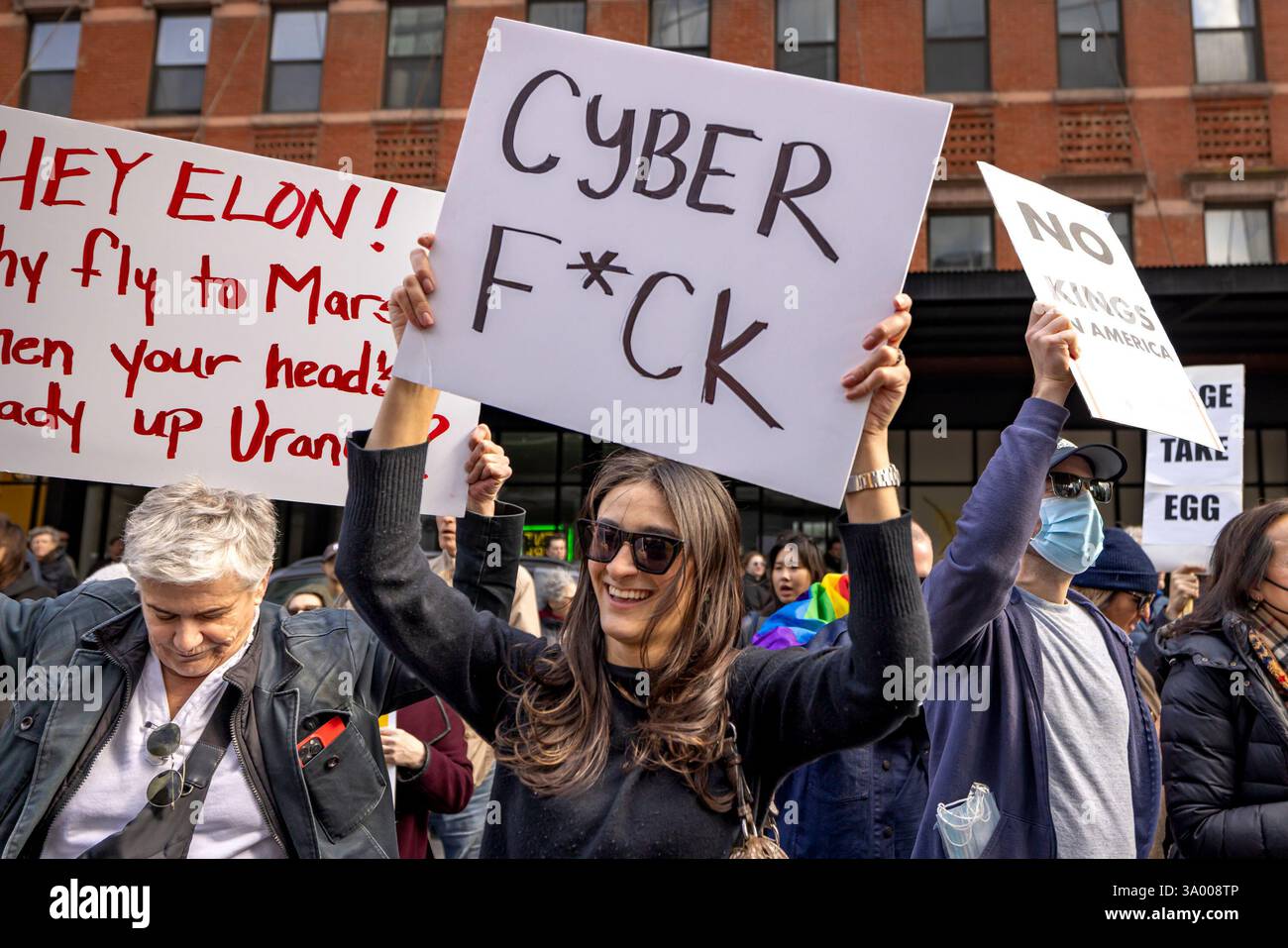 NEW YORK, NEW YORK - MARCH 1: ?A protester holds a sign that says ...