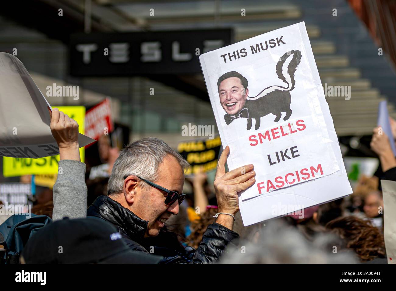 NEW YORK, NEW YORK - MARCH 1: ?A protester holds a sign that says "This ...