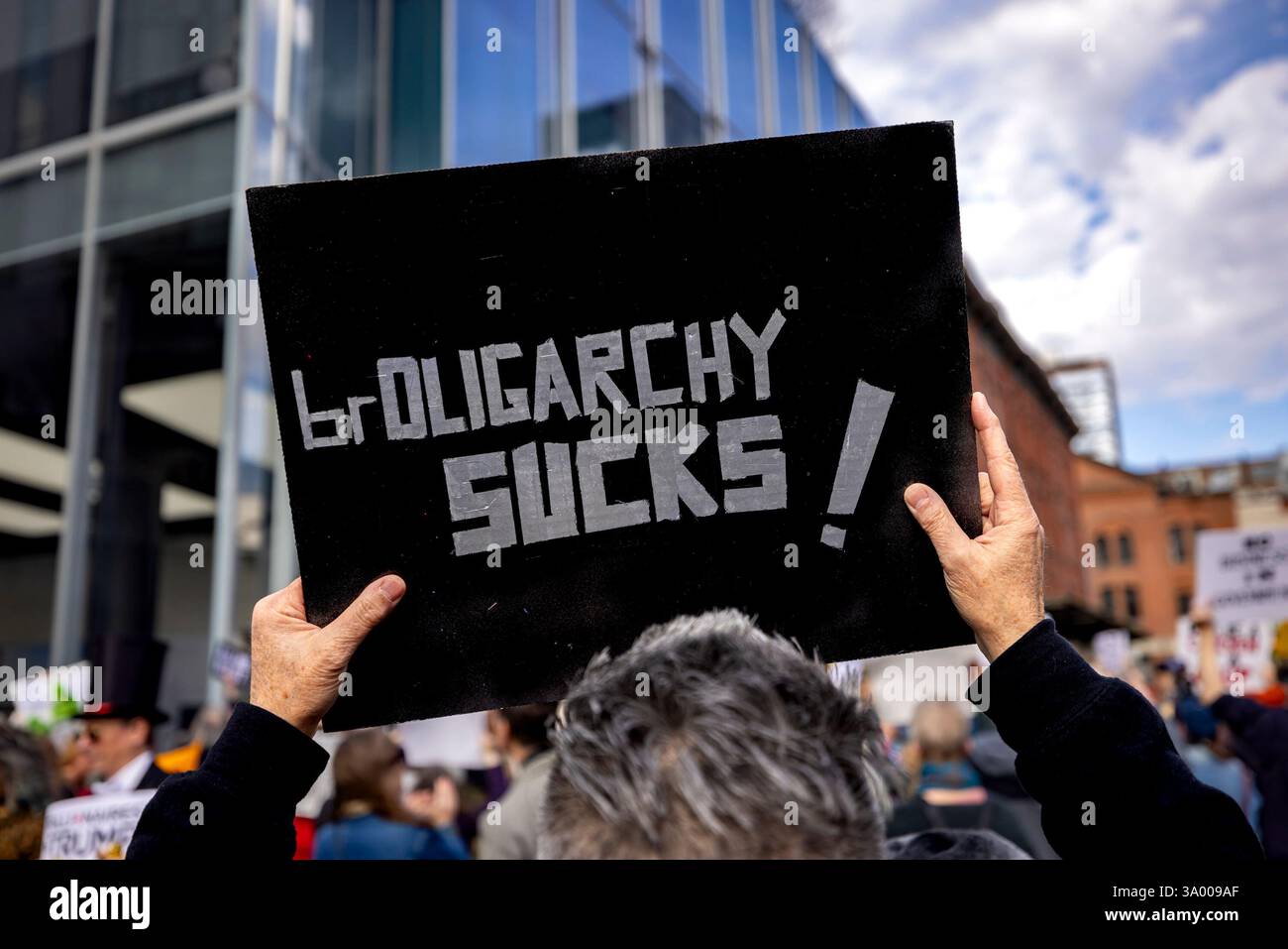 NEW YORK, NEW YORK - MARCH 1: ?A protester holds a sign that says ...
