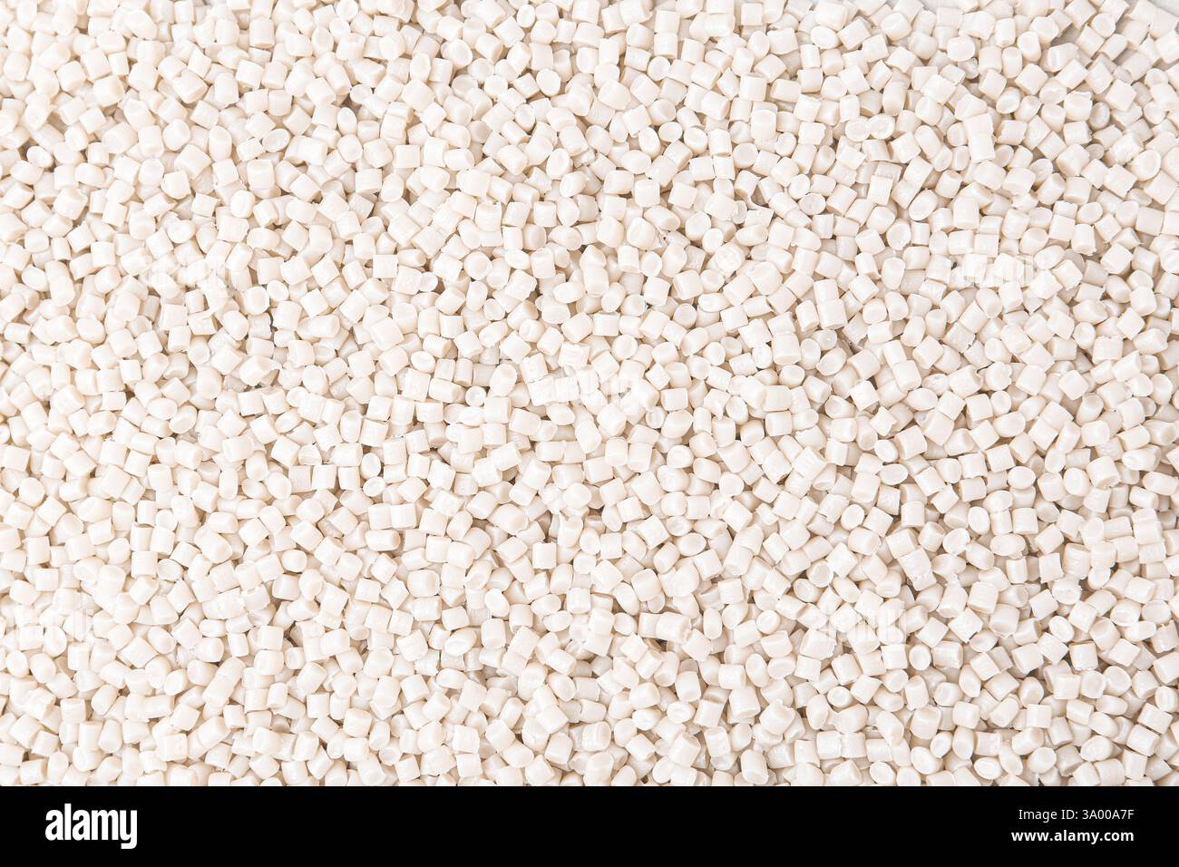 Pile of plastic granules as background, top view Stock Photo - Alamy