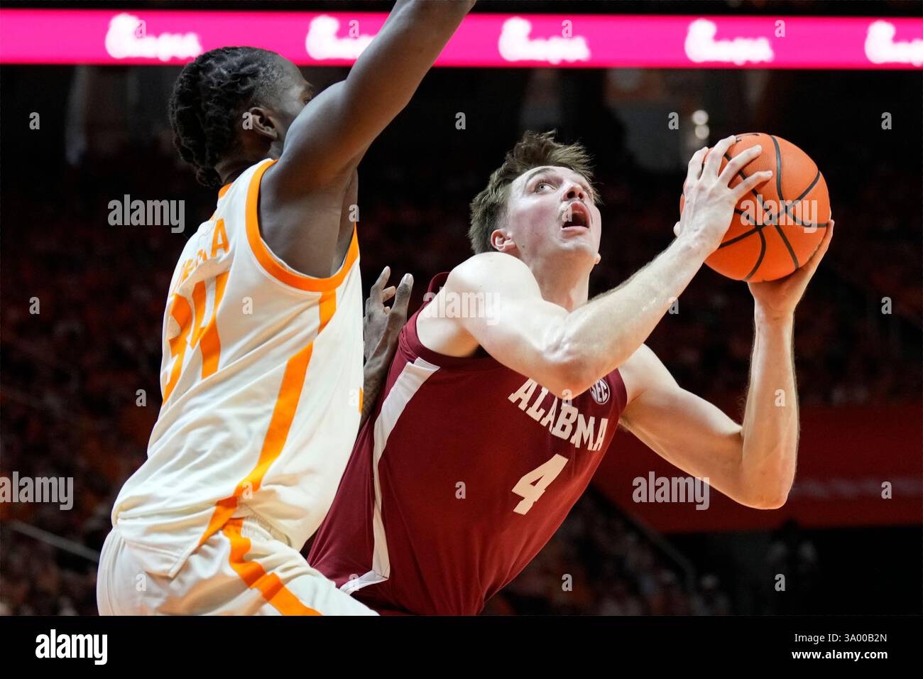 Alabama forward Grant Nelson (4) shoots against Tennessee's Felix ...