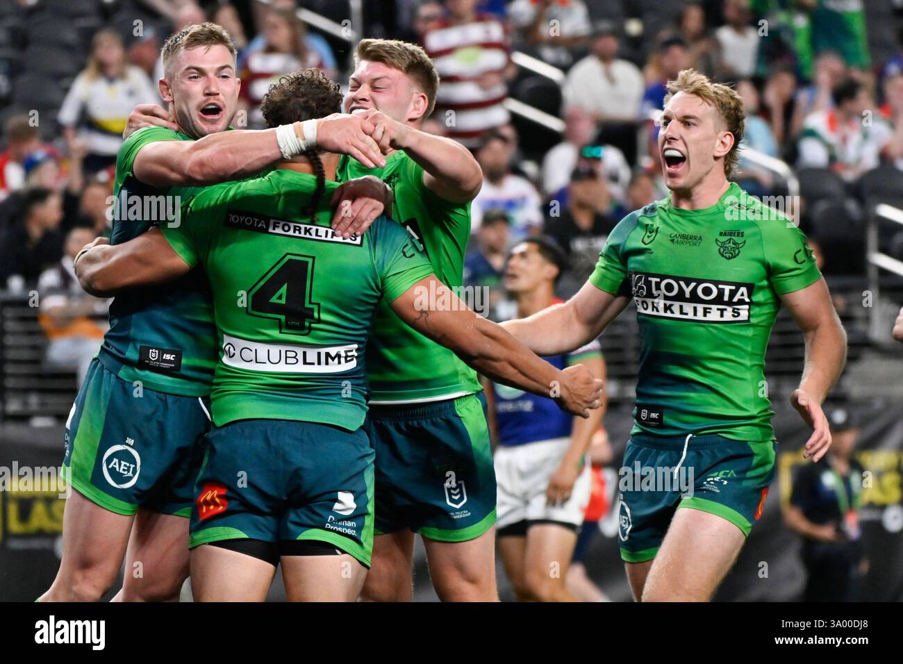 Canberra Raiders players celebrate after teammate Sebastian Kris ...