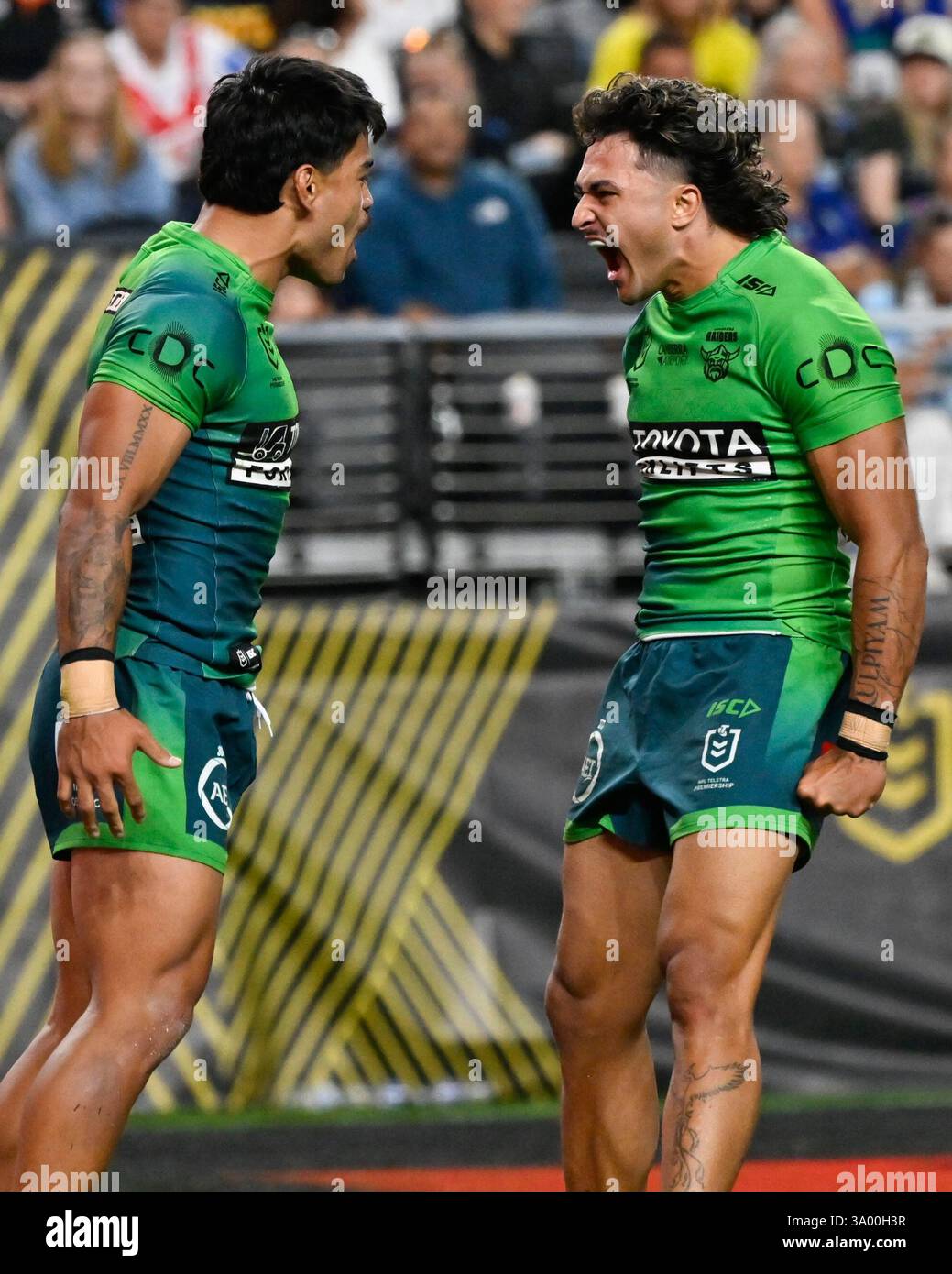 Canberra Raiders Matthew Timoko, left, is congratulated by teammate ...