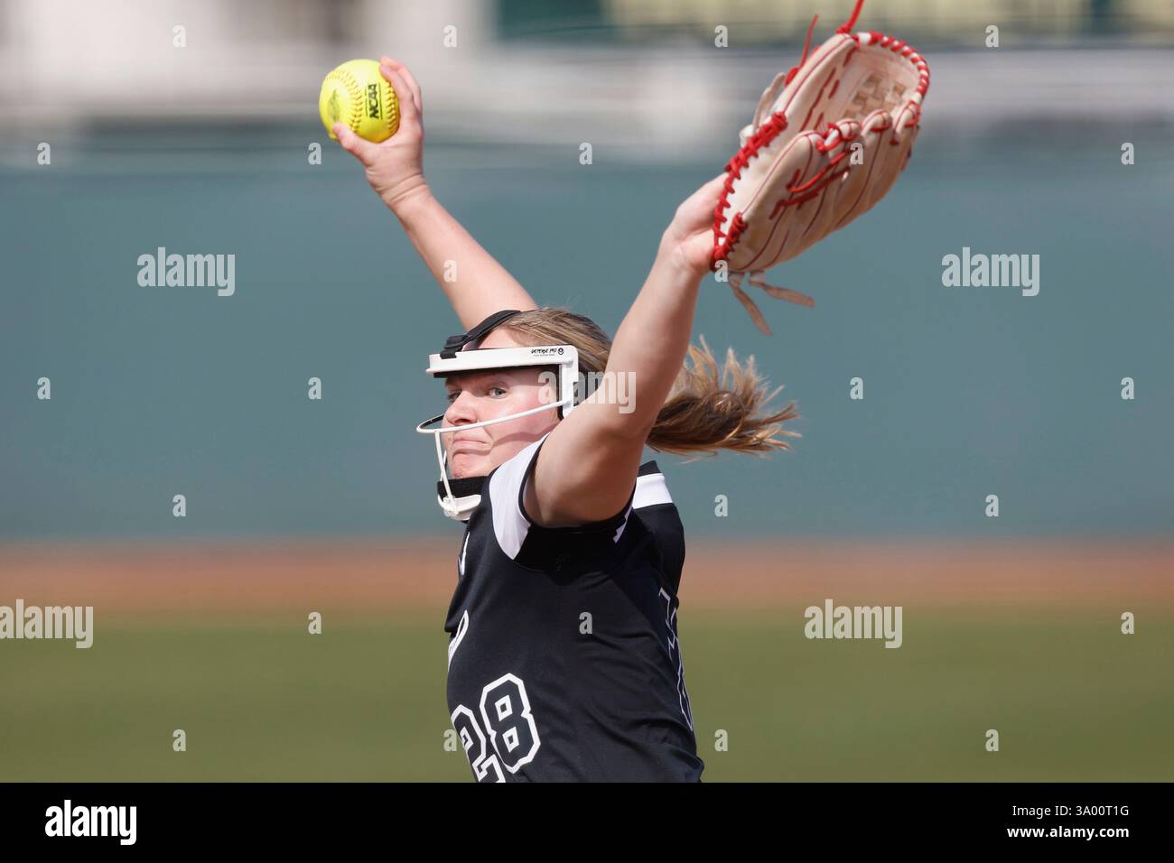 Santa Clara pitcher Cari Ferguson (28) pitches during an NCAA softball ...