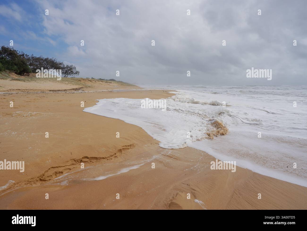 Foamy surf waves rolling in during Rough Weather from Tropical Cyclone ...