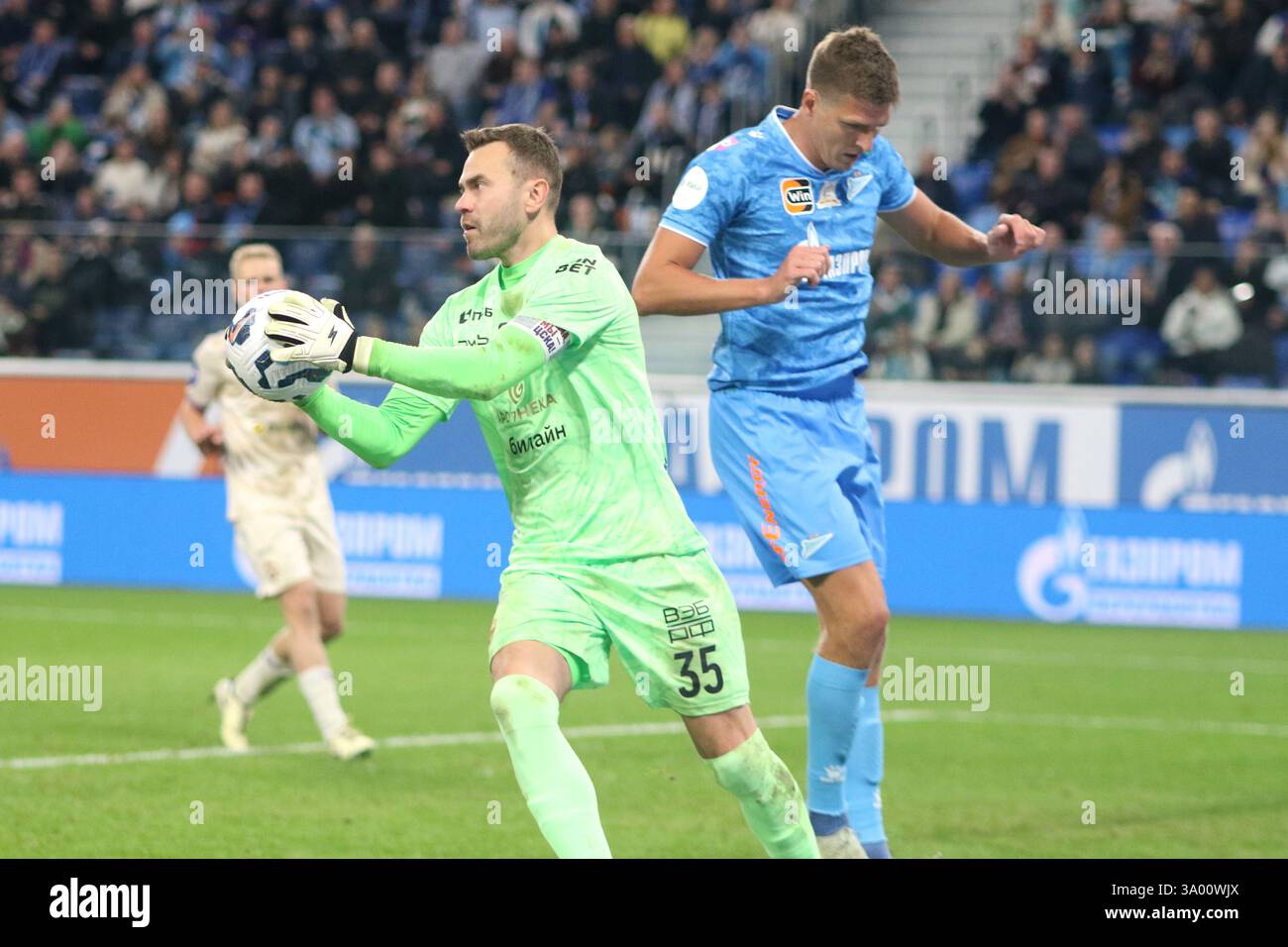 Aleksandr Sobolev (7) of Zenit, Igor Akinfeev (L) of CSKA seen in action during the Russian ...