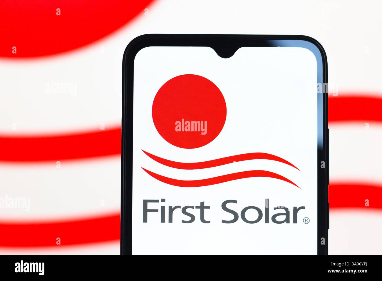 In this photo illustration, the First Solar logo is seen displayed on a ...