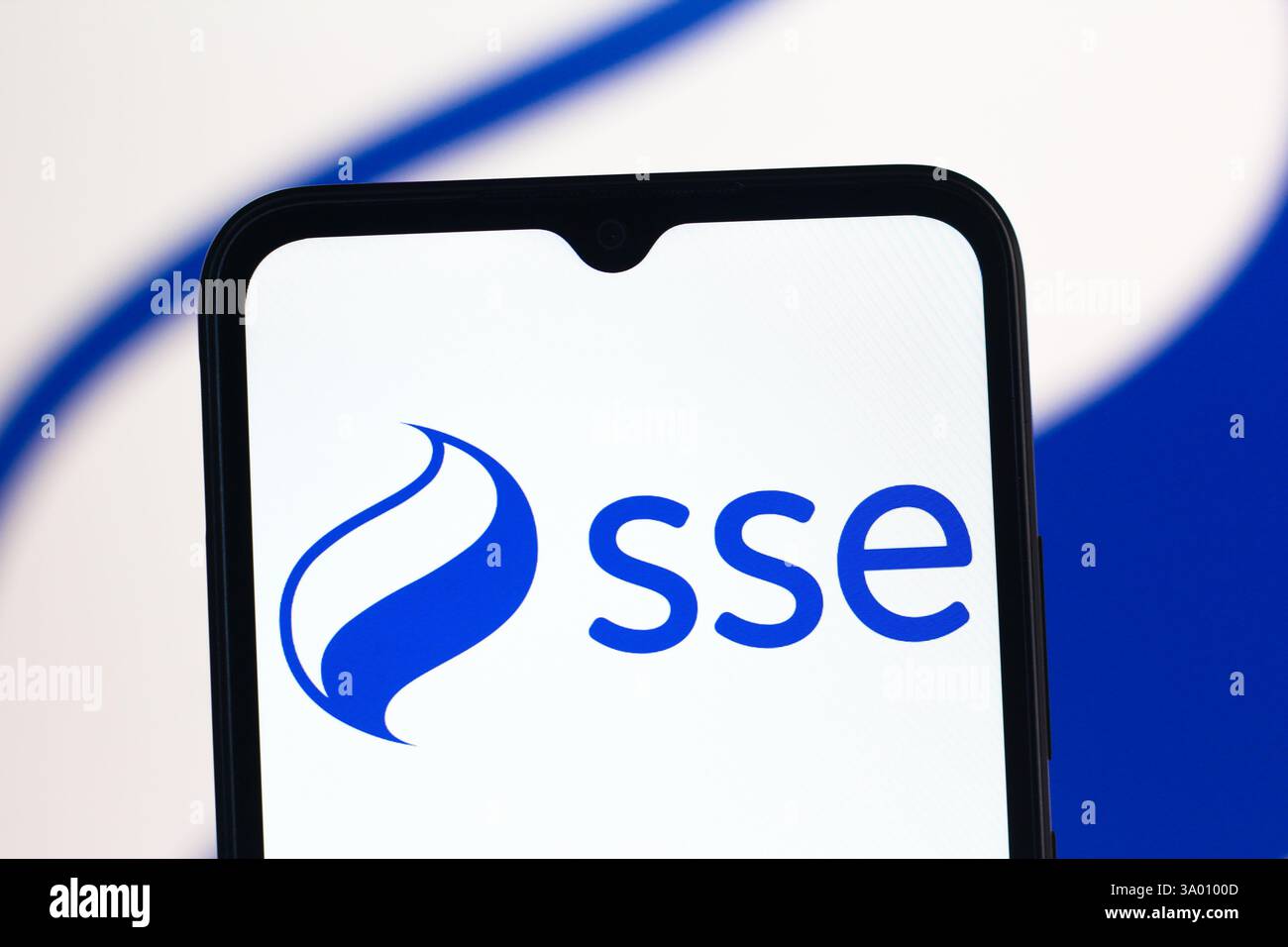In this photo illustration, the SSE logo is seen displayed on a ...