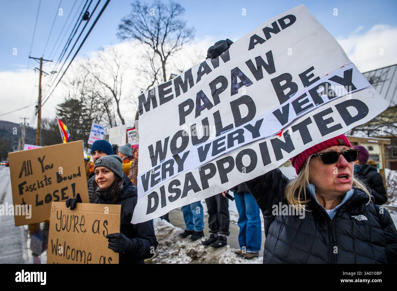 Waitsfield, Vermont, USA. 1 March 2025. Demonstrators line Route 100 in ...