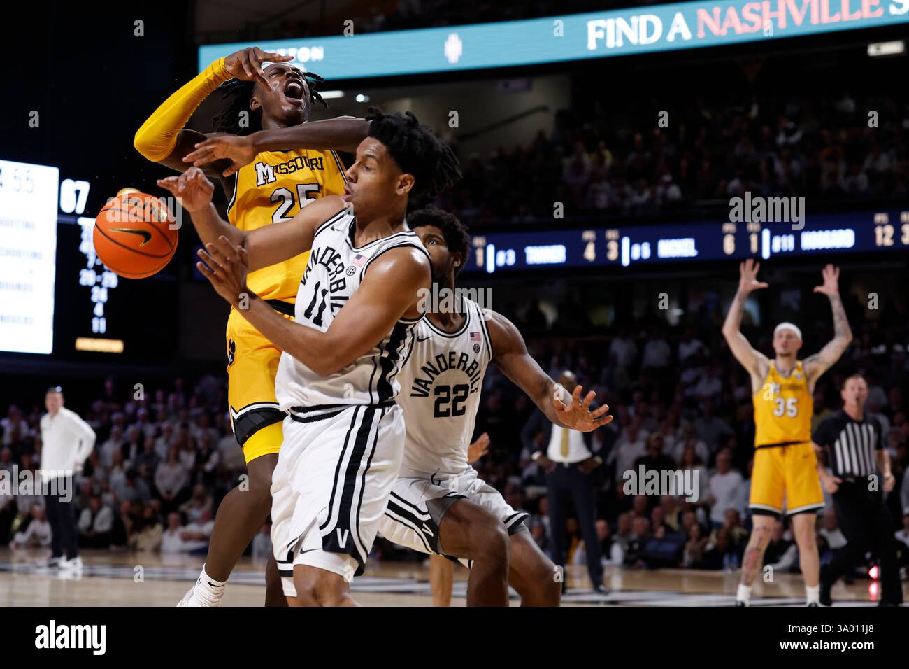 NASHVILLE, TN - MARCH 01: Vanderbilt Commodores guard AJ Hoggard (11) knocks the ball away from ...