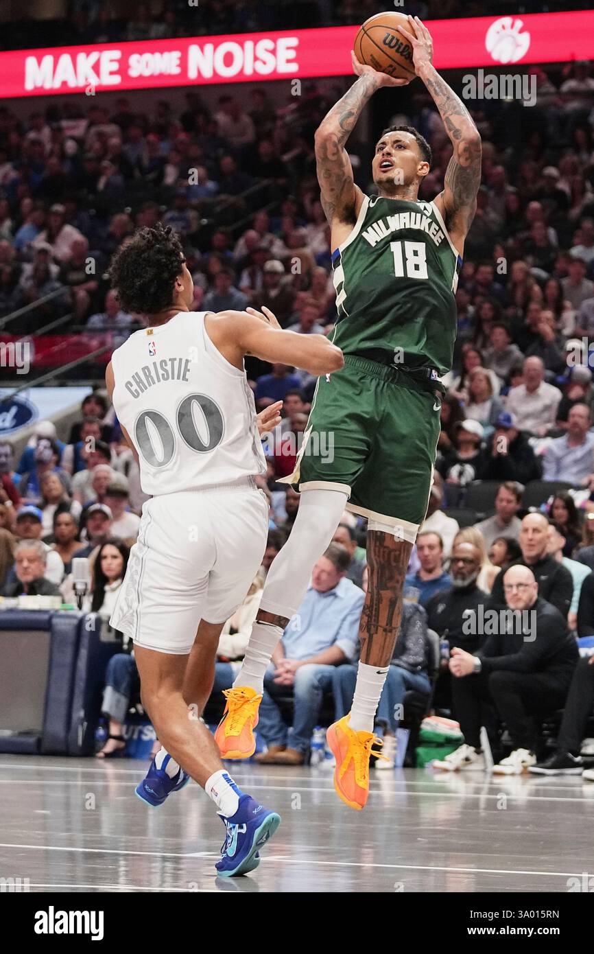 Milwaukee Bucks forward Kyle Kuzma (18) shoots over Dallas Mavericks ...