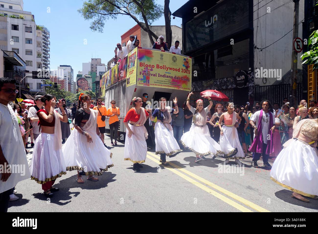 Revelers have fun at the carnival street in the Bollywood bloco party ...