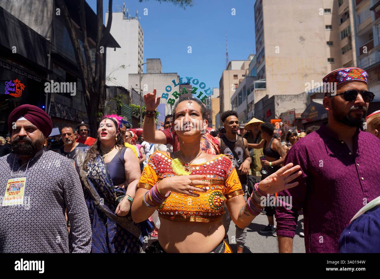 Revelers have fun at the carnival street in the Bollywood bloco party ...
