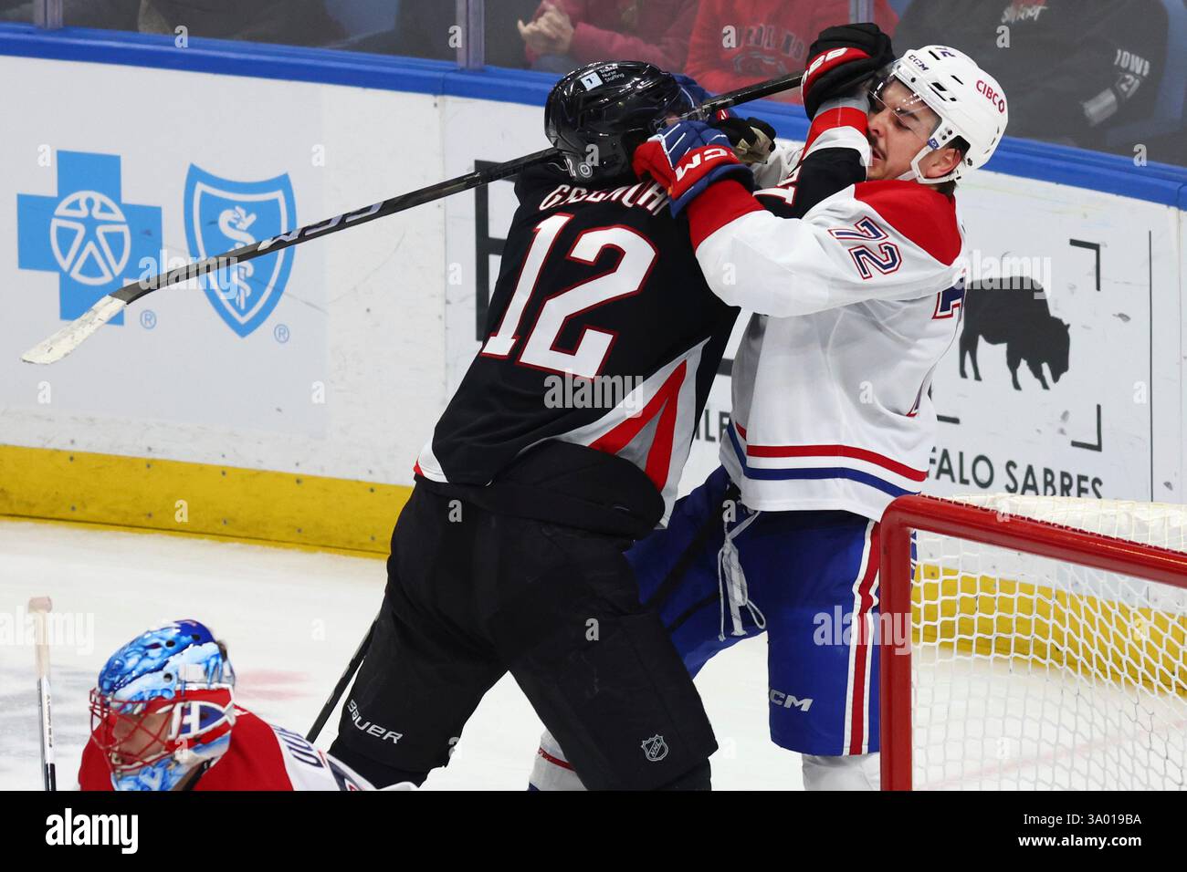 Buffalo Sabres left wing Jordan Greenway (12) and Montreal Canadiens ...