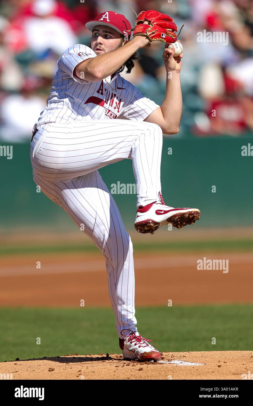 March 1, 2025: Hogs pitcher Zach Root (33) begins his windup on the ...