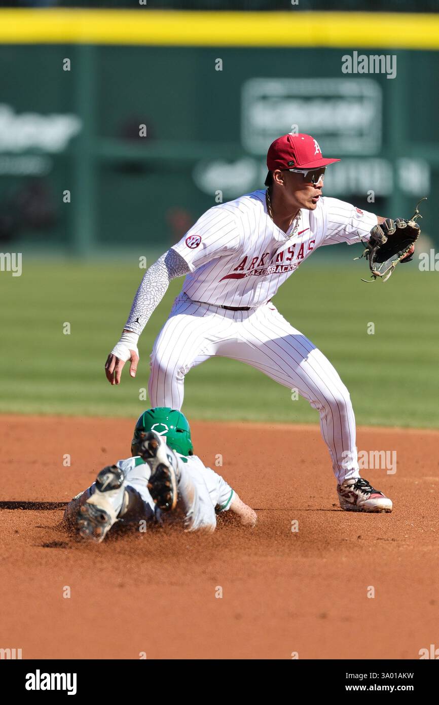 March 1, 2025: Arkansas short stop Wehiwa Aloy (9) covers .the bag ...