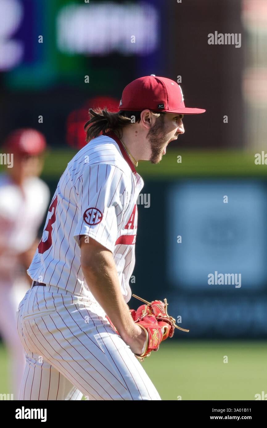 March 1, 2025: Razorback pitcher Zach Root (33) lets out a scream as he ...