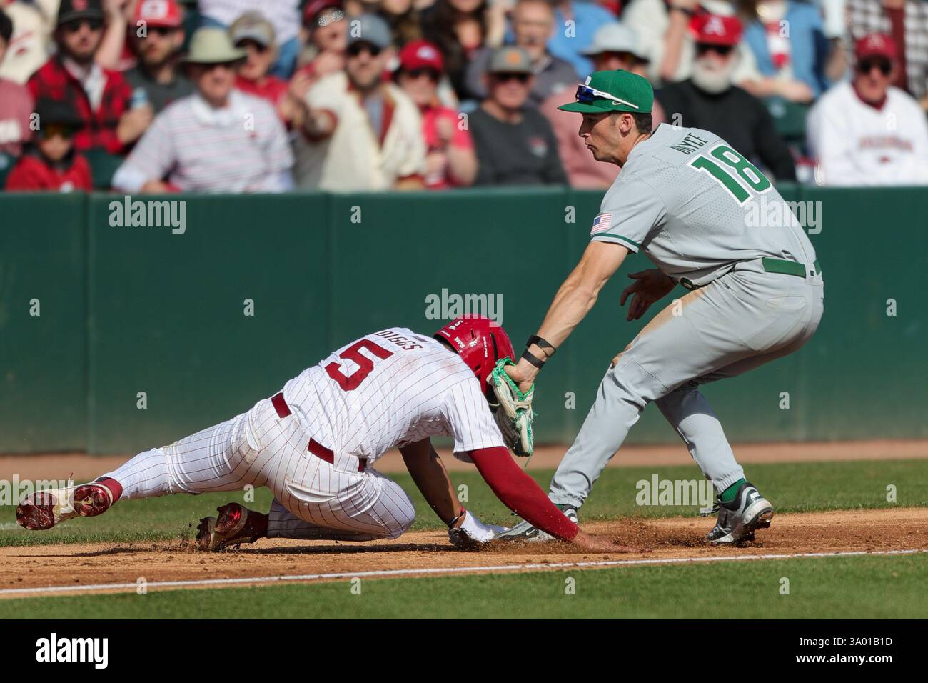 March 1, 2025: Charlotte third baseman Dawson Bryce (18) applies to tag ...