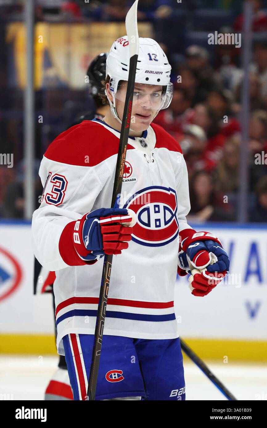 Montreal Canadiens right wing Cole Caufield (13) looks on during the ...
